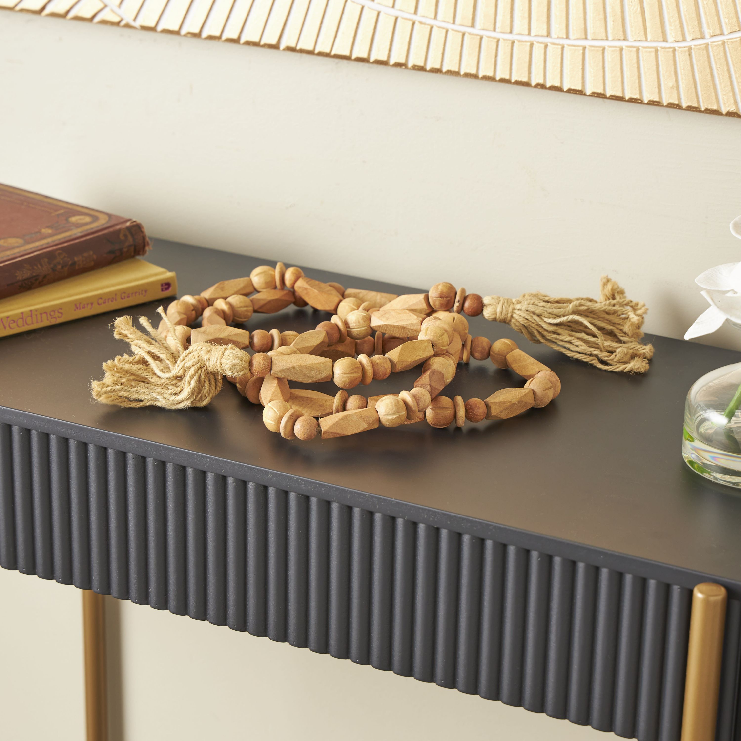 Monroe Lane Bohemian Mango Wood Garland with Tassel | Belk